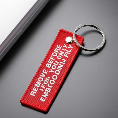 China Personalized Airbus Woven Keychain with Remove Before You Fly Design and 3.5 Inches Size for sale