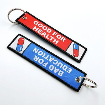 China Double Side Custom Personalized Woven Fabric Keyring Jet Tag KeyChain Tag Accessories Embroidery Keychains for Gifts for sale