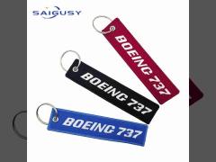 Chave de Chave Boeing 737 personalizada. Bordado com tema de aviação. Opções multicoloridas e ecológicas.