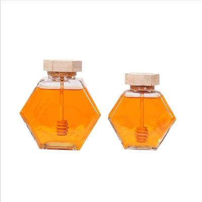 China Wholesale 100ML 220ML 380ML 500G Food Container Glass Jam Jar Custom Hexagon Empty Honey Glass Jar With Wood Lid Dipper for sale