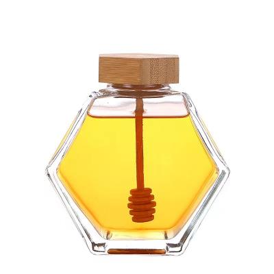 China High Quality 100ml 220ml 380ml Hexagonal Transparent Clear Glass Honey Jar Glass Storage Bottle With Bamboo Lid for sale
