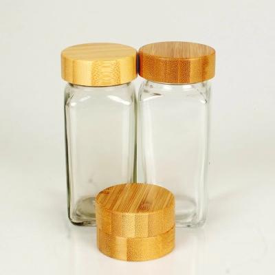China 2oz 60ml Square Clear Glass Spice Jars with Bamboo Lids Seasoning Storage Bottles for Spice Rack, Cabinet, Drawer for sale