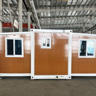 China Double wing foldable container house Three-in-one mobile expandable house for sale