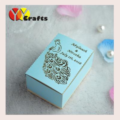 China Luxury peacock wedding gift packing box with laser cutting names logo for sale