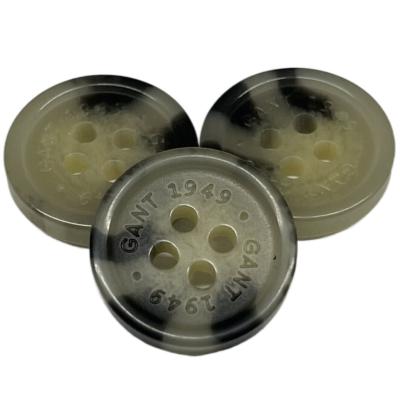 Cina 26L ha inciso il colore di Brown del foro dell'orlo 4 di Logo Fake Horn Button With in vendita