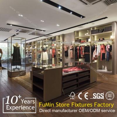 China Wooden retail clothes display shelf for garment shop for sale
