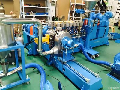 China Air-cooled die face hot pelletizing twin-screw extruder for sale