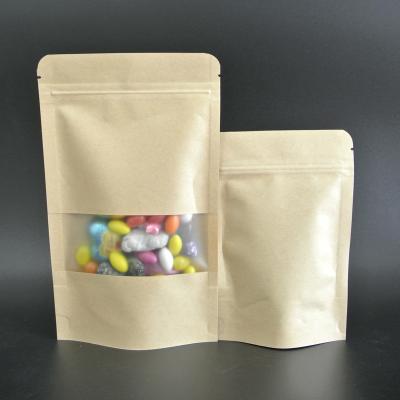 China Sacos Kraft de plástico laminado à prova d'água e recolocáveis Ziplock Castanho com janela para armazenar chá, grãos de café, embalagens de alimentos à venda