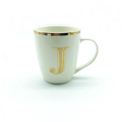 Cina Decalcomania dorata di 11 Oz che stampa la tazza bevente del caffè ceramico messa con il bordo dell'oro in vendita