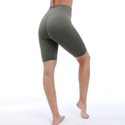 Cina Calzoncini da yoga a vita alta per donne senza cuciture laterali Controllo della pancia Anti-acne in vendita