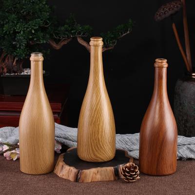Cina Dimensioni personalizzate accettate 750ml/350ml Bottiglia di vetro a modello di legno per birra Acqua Champagne in vendita