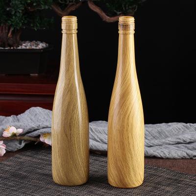 Cina Dimensioni personalizzate accettate 750ml/350ml Bottiglia di vetro a modello di legno per birra Acqua Champagne in vendita