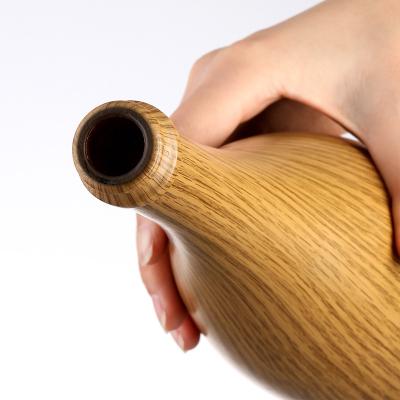 Cina Dimensioni personalizzate accettate 750ml/350ml Bottiglia di vetro a modello di legno per birra Acqua Champagne in vendita