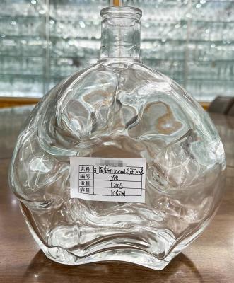 China 500 ml 700 ml 750 ml garrafas de vidro de vodka de pedra com superfície de estampação a quente à venda