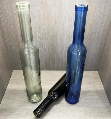 中国 無料で提供されるガラスボトル 500ml 375ml 対応蓋付きの緑色オリーブ油ボトル 販売のため