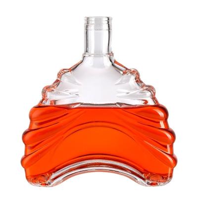 Cina Logo personalizzato Bottiglia di vetro a forma di oblate trasparente per 500 ml 750 ml di liquore di whisky brandy in vendita