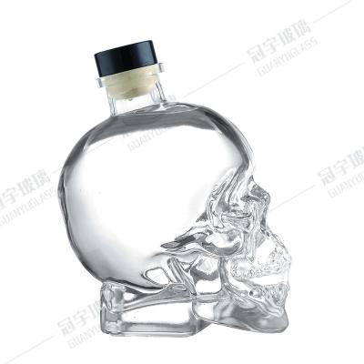 中国 180ml 200ml 300ml 400ml 750ml ガラスボトル コークキャップ 頭蓋骨デザイン ワイン愛好家向け 販売のため