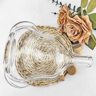 Cina 1000ml Spiriti a forma di zucca Bottiglia in vetro di brandy con tappo chiaro e design unico in vendita