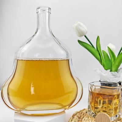 Cina 1000ml Spiriti a forma di zucca Bottiglia in vetro di brandy con tappo chiaro e design unico in vendita