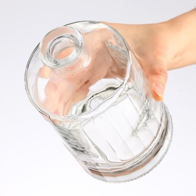 Cina Logo personalizzato Botella De Vidrio Acqua Bendita Ventilatore Bottiglia di vetro Tappo Bottiglia Butifull Luxury in vendita