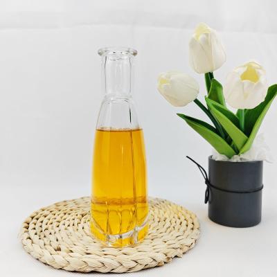 China 500ml Clear Flat Round Empty Whiskey Spirit Tequila Vodka Brandy Glass with Stopper for sale