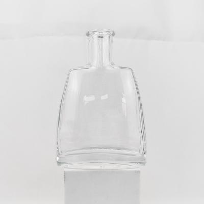 China 500ml Clear Flat Round Empty Whiskey Spirit Tequila Vodka Brandy Glass with Stopper for sale