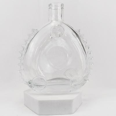 China Special Craftsmanship Brandy Bottle Unique Flat Round Design with Crystal Flower Shape for sale