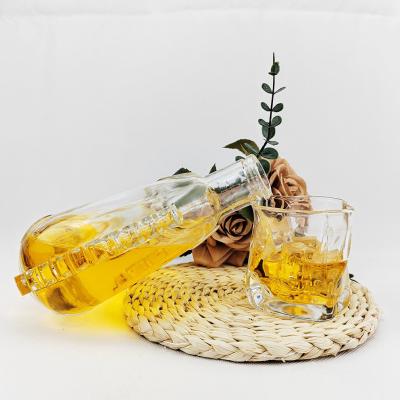 China Special Craftsmanship Brandy Bottle Unique Flat Round Design with Crystal Flower Shape for sale