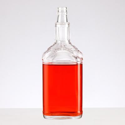 China Garrafa de vinho de vidro de 550ml 750ml personalizada com tampa de parafuso de metal e logotipo personalizado à venda