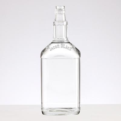 China Garrafa de vinho de vidro de 550ml 750ml personalizada com tampa de parafuso de metal e logotipo personalizado à venda