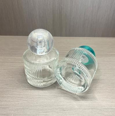 Cina Bicchiere in vetro a cilindro a strisce bottiglie di profumo di profumo classico 30 ml 50 ml in vendita