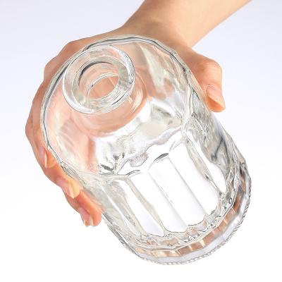 China Warm stempelen oppervlak hantering Custom logo lege glazen fles voor drank rum gin tequila Te koop