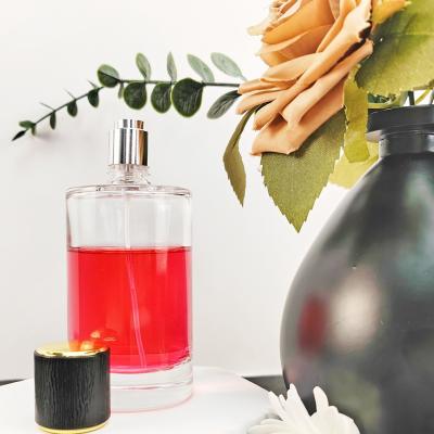 Cina Bottiglia di profumo in vetro rotondo con tappo d' argento vuoto con fondo spessa e materiale trasparente in vendita