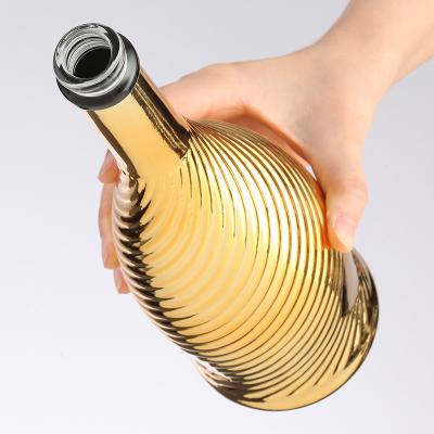 Cina Velocità di utilizzo UV Superficie manipolazione bottiglia di liquore di lusso 750 ml bottiglia di champagne in vetro dorato in vendita