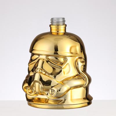 Cina Creative Golden Skull Vodka Shot Whiskey Decanter Bottiglia di vetro con tappo a vite 200ml in vendita