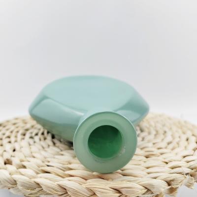 Cina Bottiglie di aromaterapia quadrate trasparenti di vetro piatto per uso domestico Bottiglia di vetro di aromaterapia in vendita