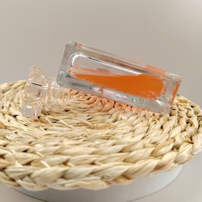 China Botella de perfume de vidrio con tapa personalizada 30ml 50ml 100ml en venta