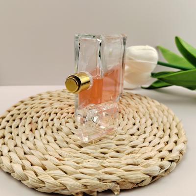 China Botella de perfume de vidrio con tapa personalizada 30ml 50ml 100ml en venta