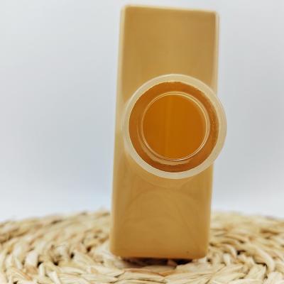 Cina Bottiglia di vetro per aromaterapia piatta quadrata multicolore da 100 ml con tappo a vite e garanzia in vendita