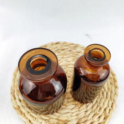 Cina Bottiglia di vetro trasparente a tappo rotondo da 200 ml per diffusori per auto e stanze in vendita