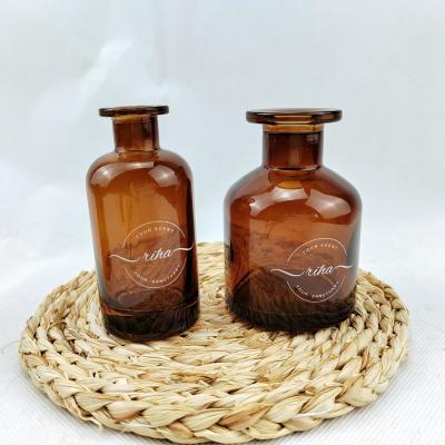 Cina Bottiglia di vetro trasparente a tappo rotondo da 200 ml per diffusori per auto e stanze in vendita