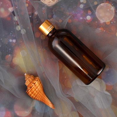 Cina Bottiglia in vetro di 10 ml, 20 ml e 30 ml di olio essenziale marrone con copertura in bambù in vendita