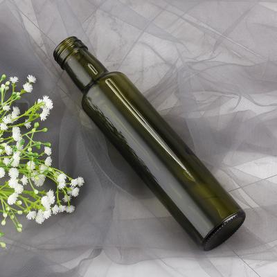 Cina Scelta del cliente 500 ml bottiglie di vetro cilindriche di condimento verde per olio d'oliva 250 ml in vendita