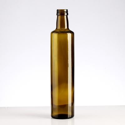 Cina Bottiglia di vetro per olio da cucina Bottiglia vuota chiara OEM/ODM Benvenuto Realizzata in vetro in vendita