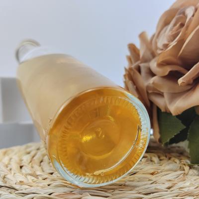 Cina Logo del cliente accettabile Colore chiaro Collo lungo Bottiglia di olio di vetro da 50 ml 100 ml con tappo di sughero in vendita