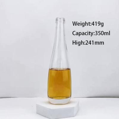 Cina 500 ml/750 ml Bottiglia di vetro per bevande Bottiglia trasparente personalizzata in vendita