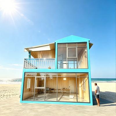 China 20&40FT Custom Layout Luxury Double Deck Modular Flat Pack House Holiday Cabin With Floor to Ceiling Glass for Glamping Resort for sale