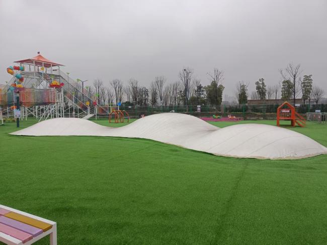 Children enjoying the Panda Jumping Cloud attraction