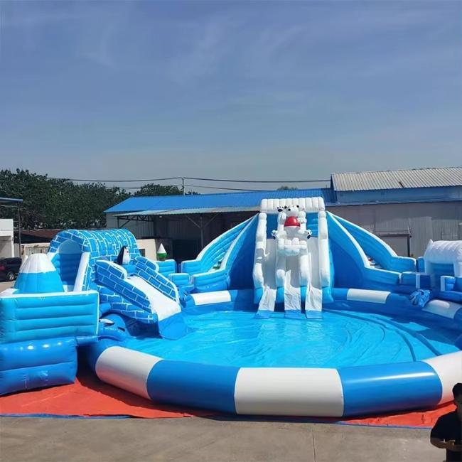 Children enjoying the inflatable water park