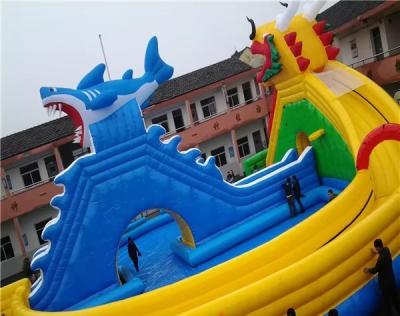 China 14*18m Inflatable Water Park with 1200w Blower and 1-20 People Capacity Dragon Shark Slide and Large Swimming Pool for sale